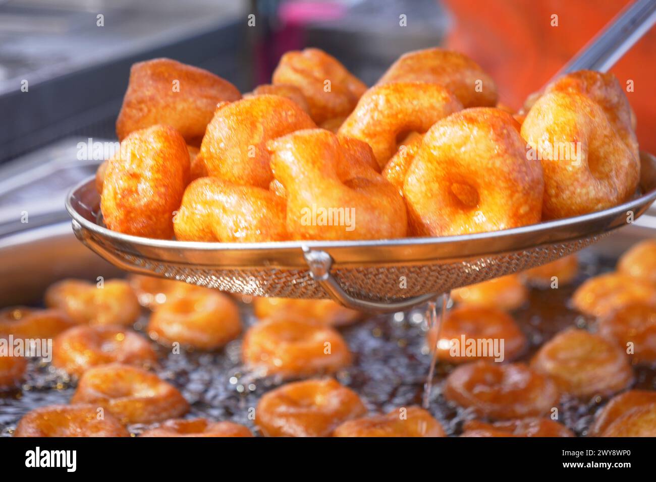 Traditional fried sweets lokma in sugar syrup Stock Photo - Alamy
