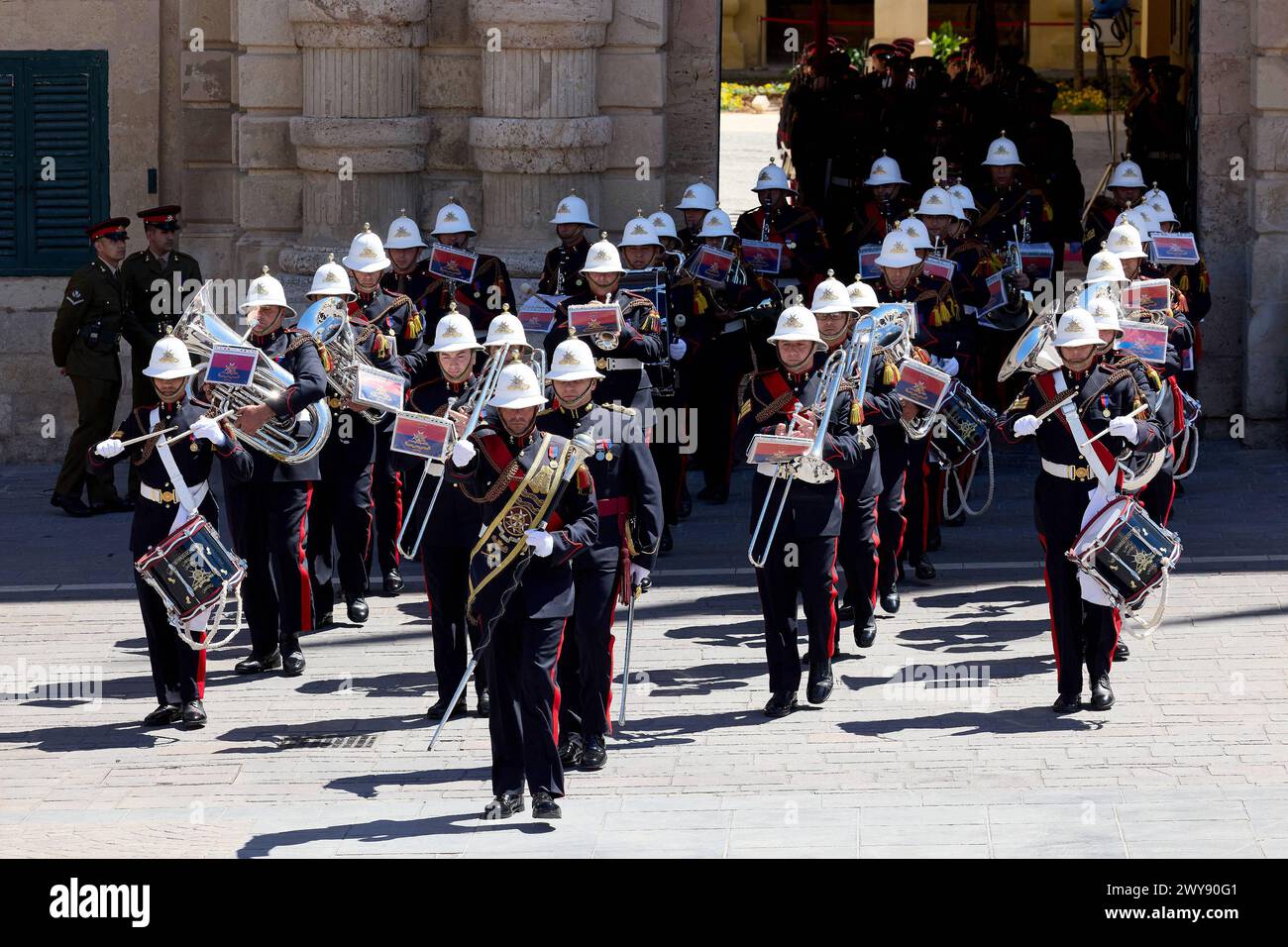 Members from the Armed Forces of Malta Band make their entry to St ...