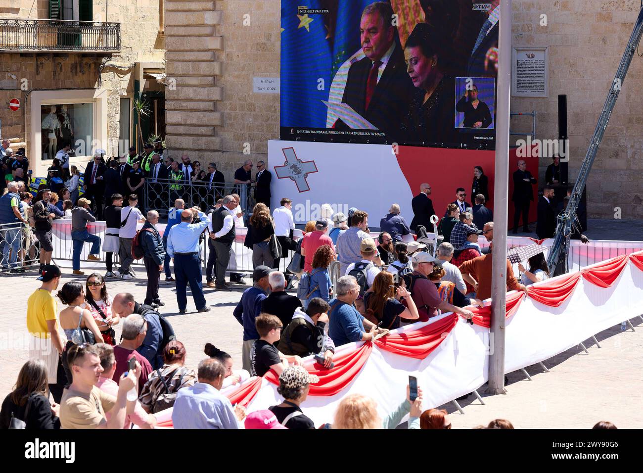 Part of the crowd watch on a big screen as President-Elect Myriam ...