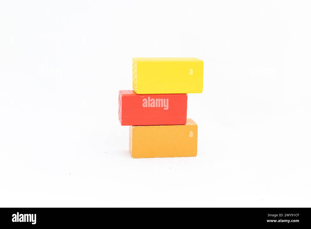 Colorful wooden blank blocks stacked isolated on white background ...