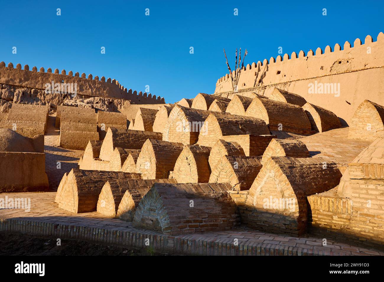 Ancient Cemetery monument near old city wall fortress in Itchan Kala of ...