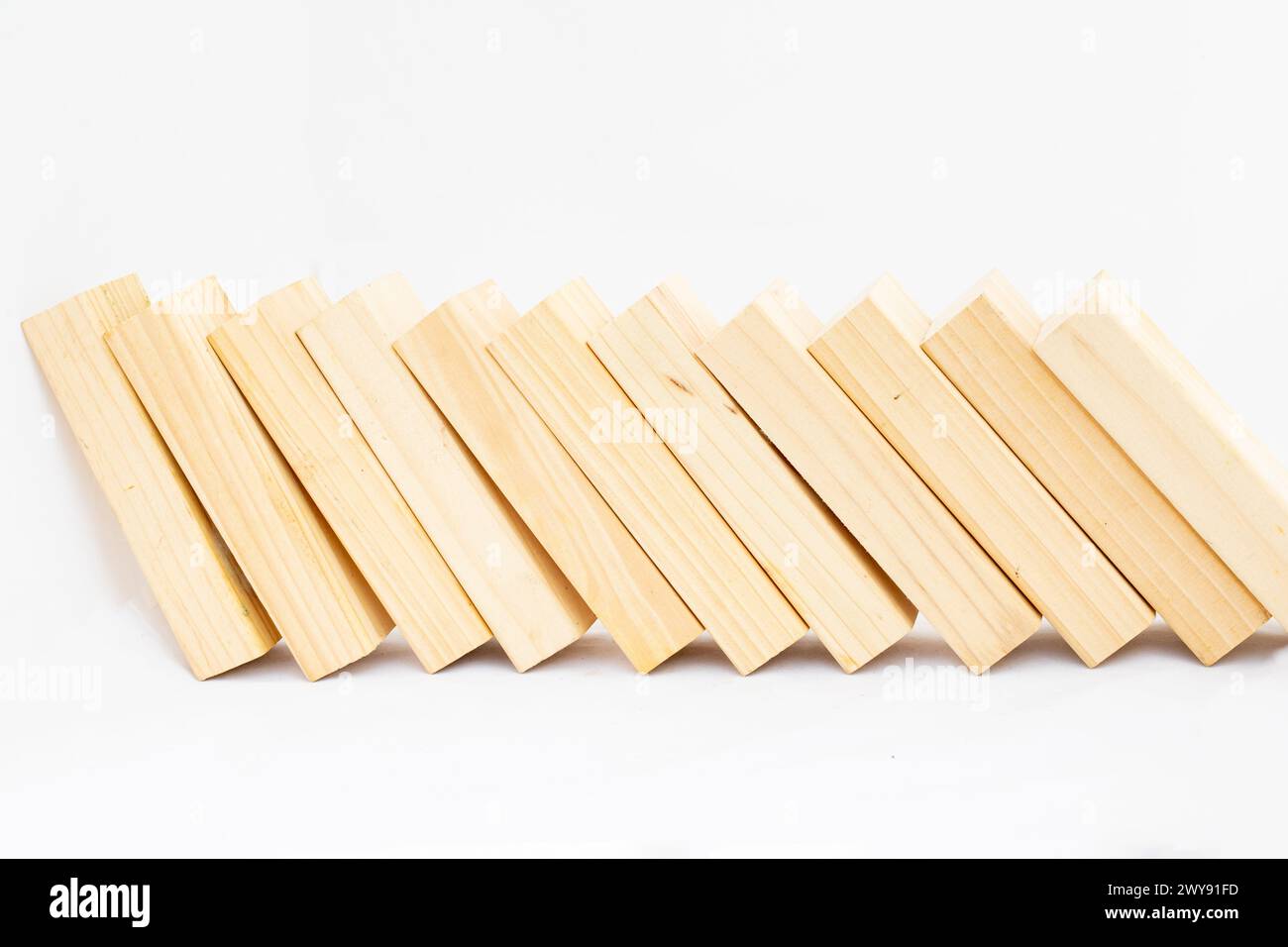 Set of blank wooden domino isolated on white background. Domino effect ... Set of blank wooden domino isolated on white background. Domino effect ...