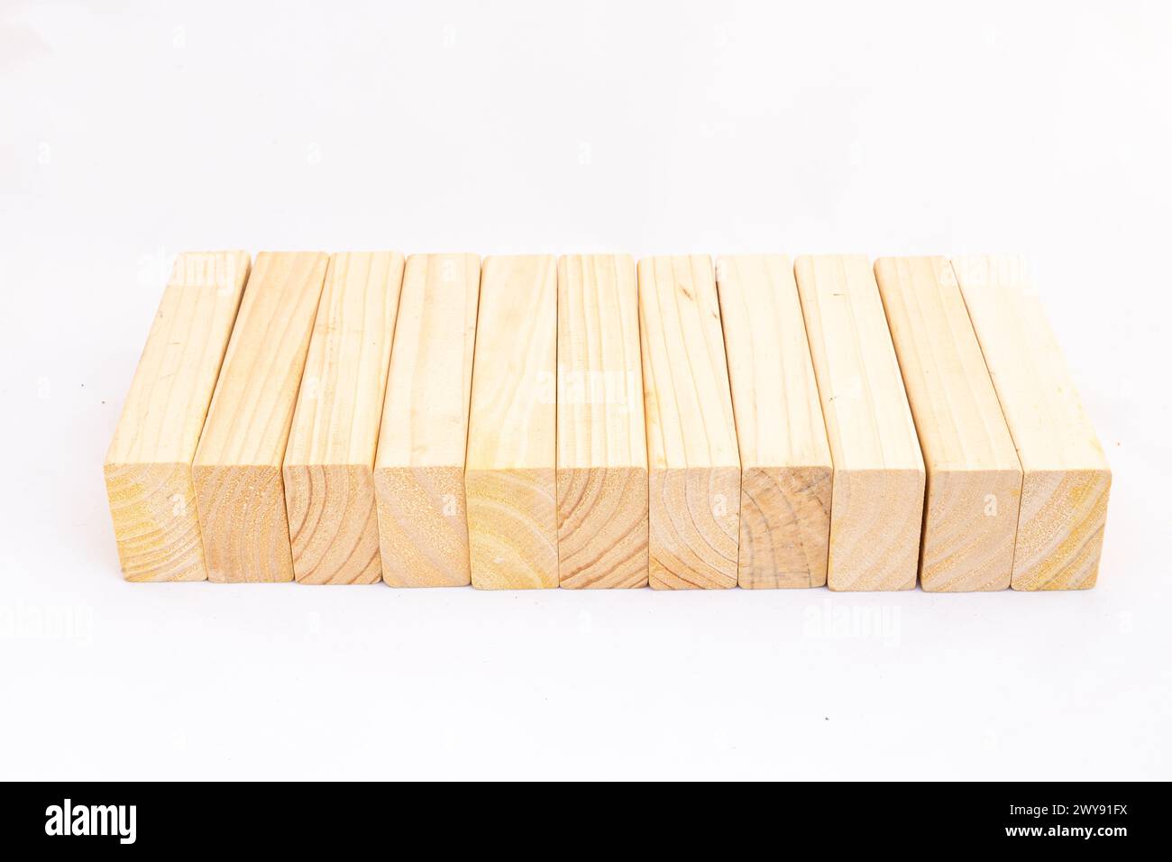 Blank wooden rectangular blocks row on white isolated background. Copy ...