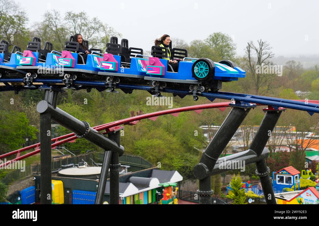 Legoland team members Shenica Gumbs (left) and Jenella Tudtud test ride ...