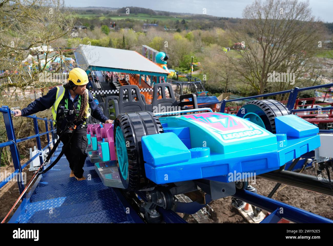 Legoland team member Shenica Gumbs inspects a car on the Minifigure ...