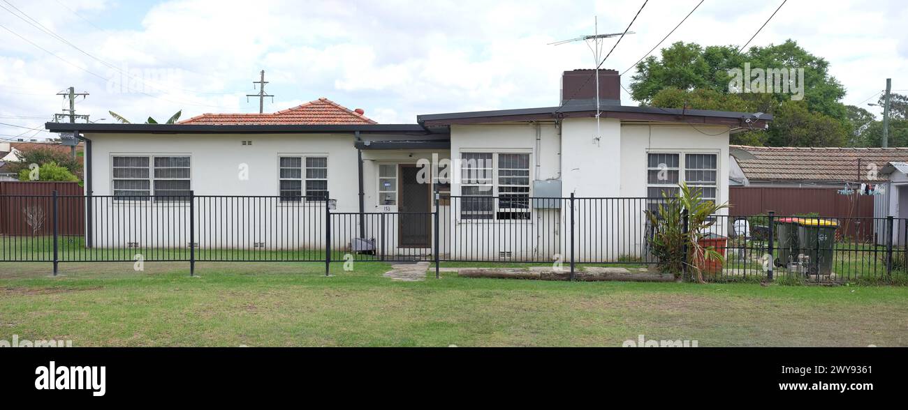 Mid-century single story low-set house with skillion roof in the ...