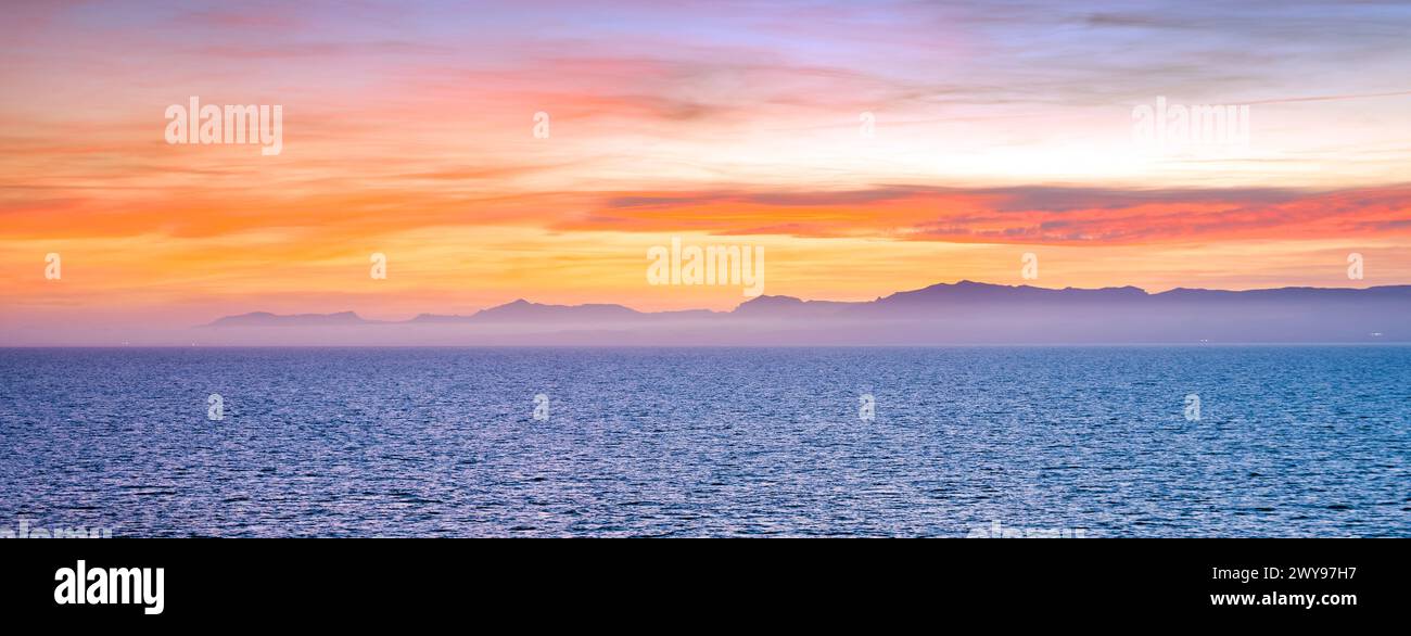 Mist over the sea at sunset hi-res stock photography and images - Alamy