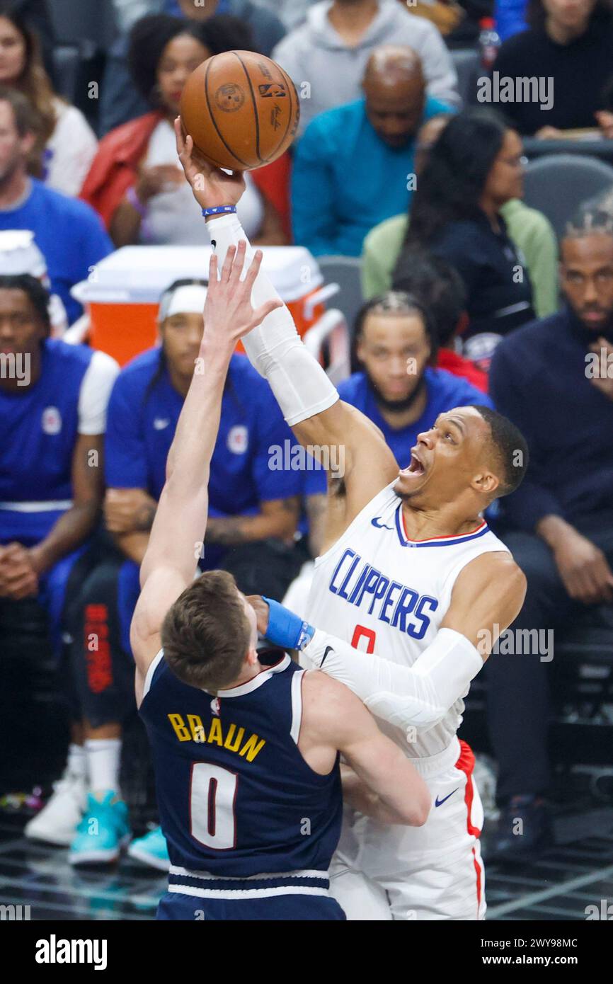 Los Angeles, USA. 4th Apr, 2024. Russell Westbrook (R) of Los Angeles Clippers goes for a layup ...