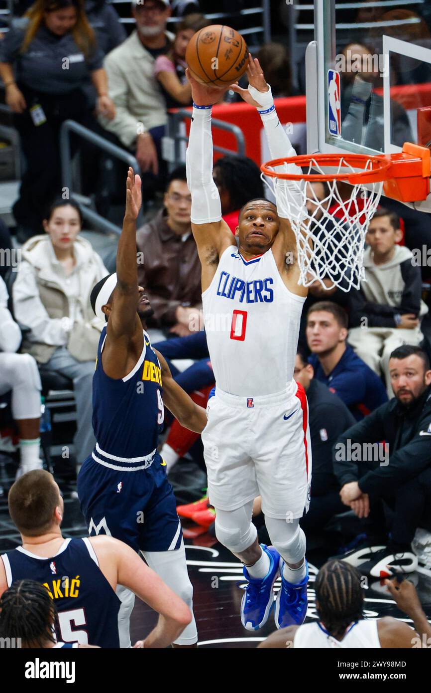 Los Angeles, USA. 4th Apr, 2024. Russell Westbrook (R) of Los Angeles Clippers dunks during the ...