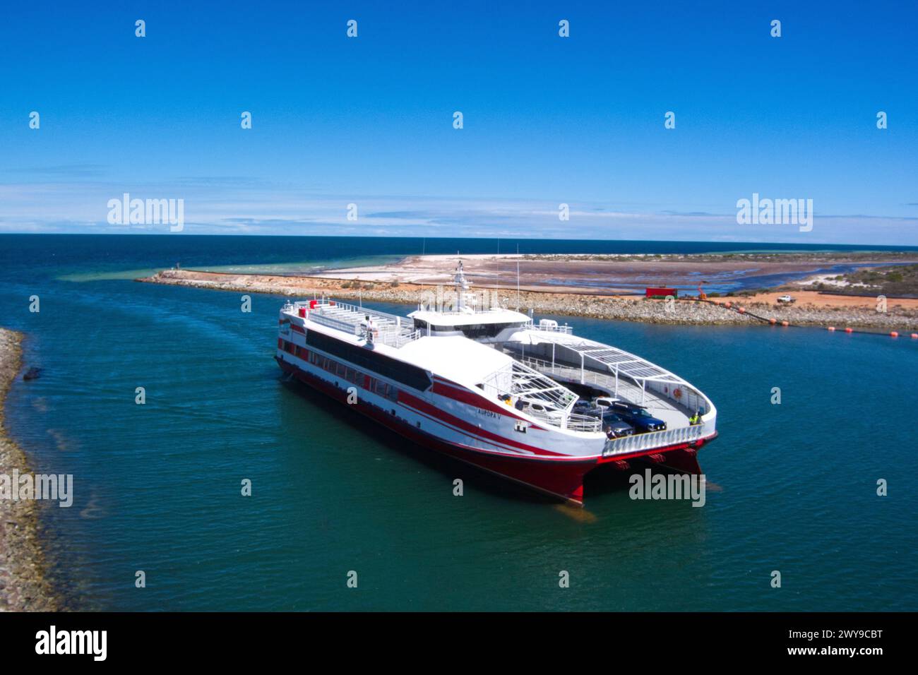 Aerial of the Wallaroo to Lucky Bay car ferry berthing at Lucky Bay ...