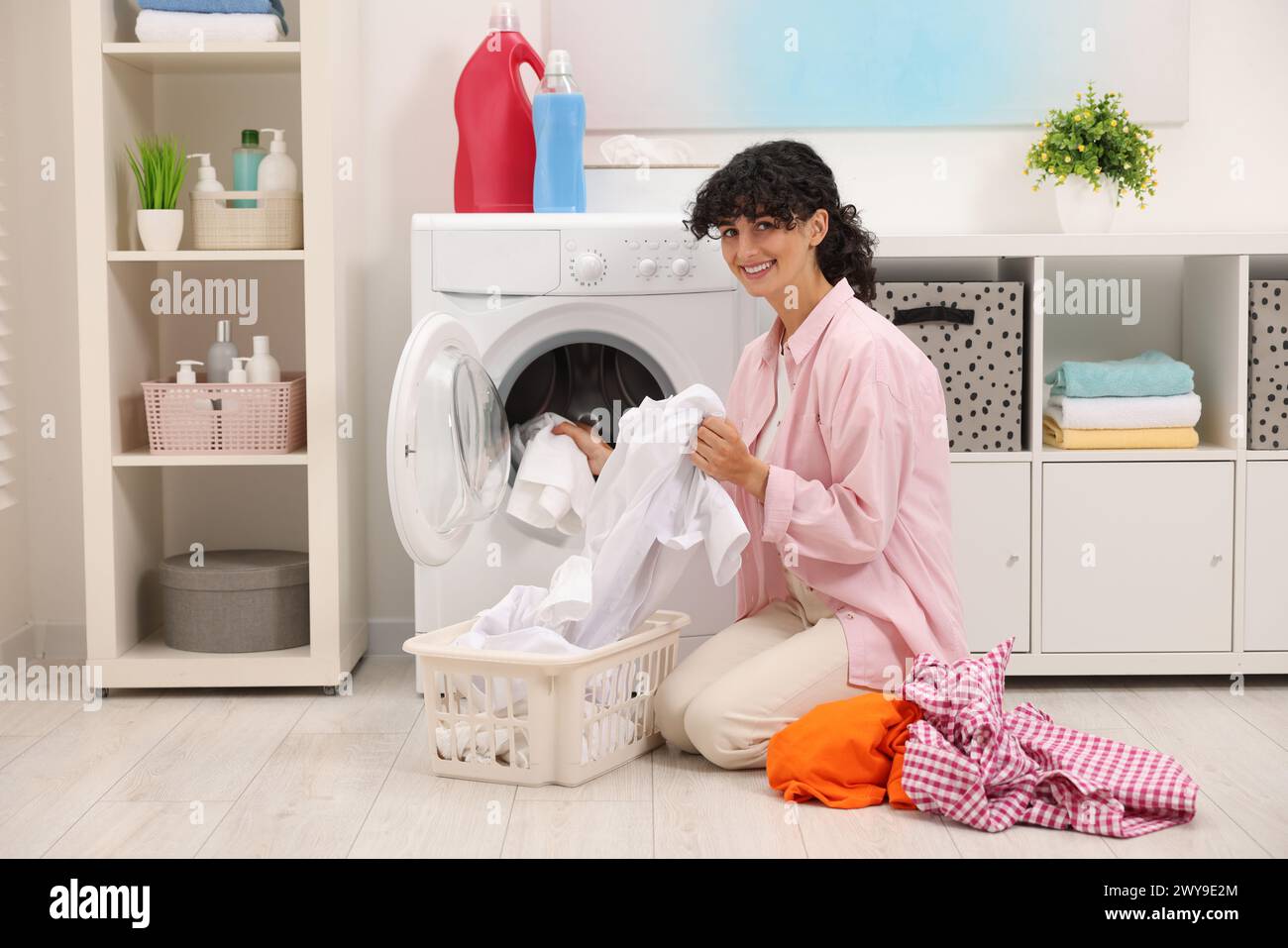 Young housewife washing machine clothes washing hi-res stock photography and images - Alamy