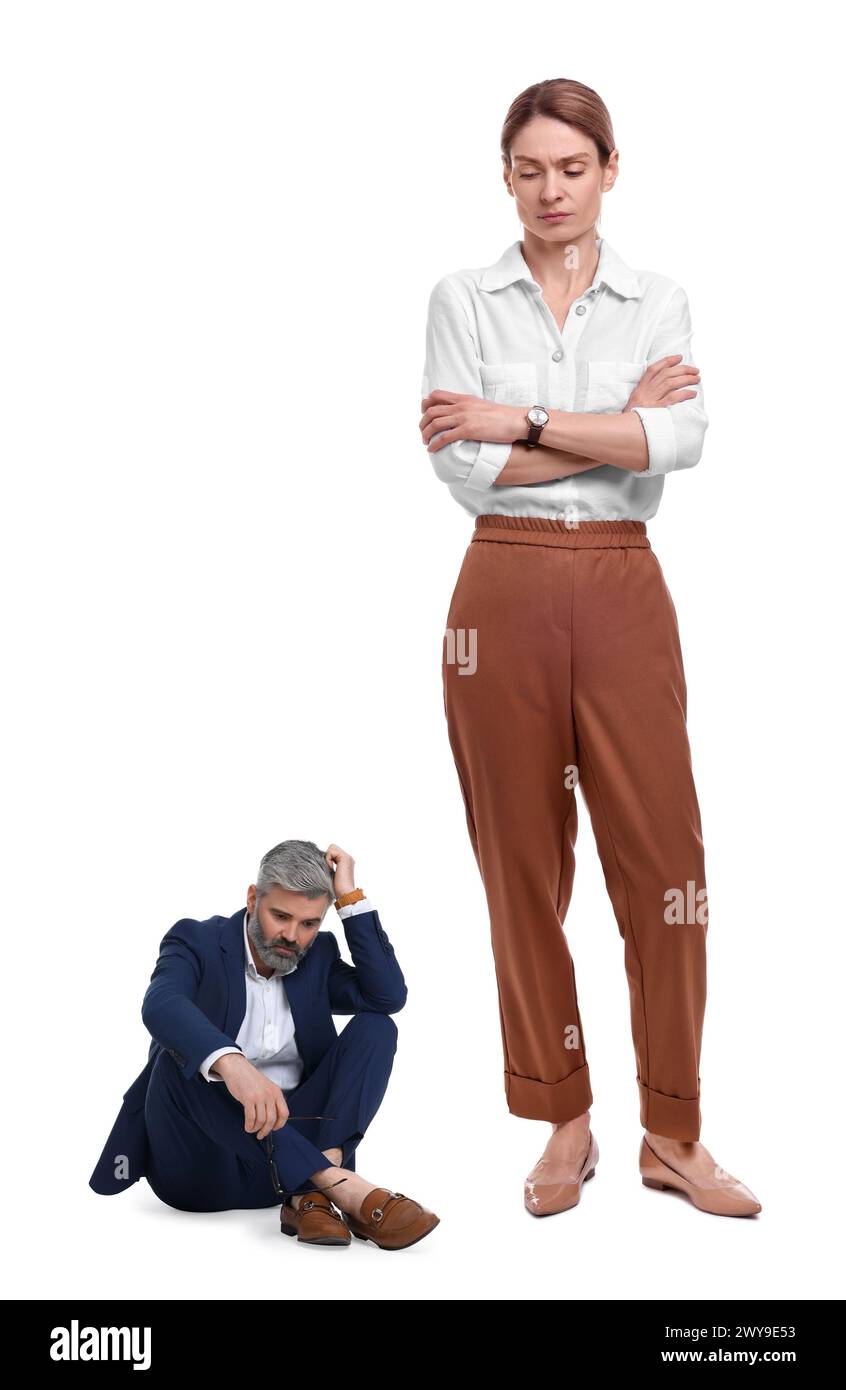 Giant woman and sad small man on white background Stock Photo - Alamy