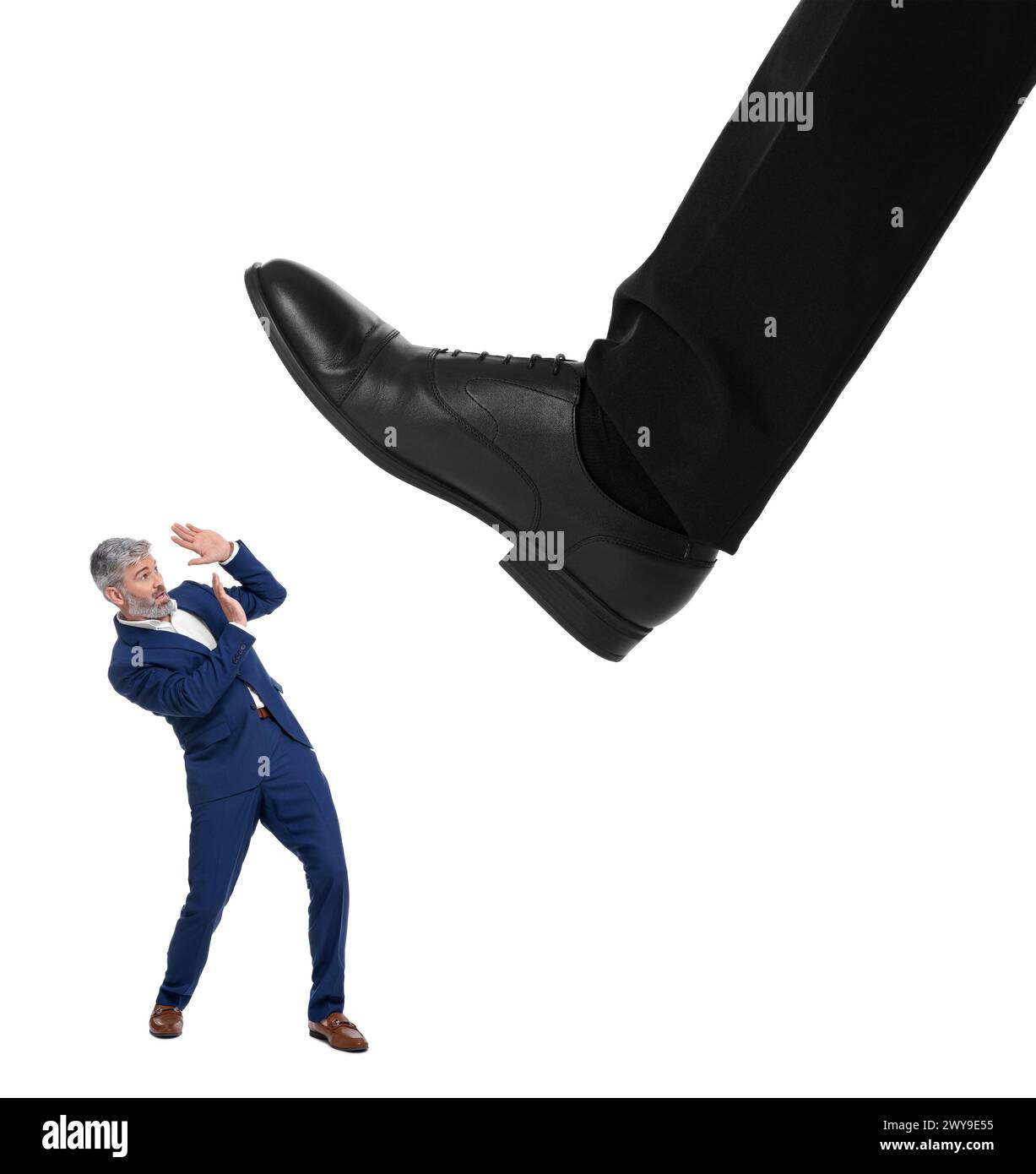 Giant stepping onto small man on white background Stock Photo - Alamy