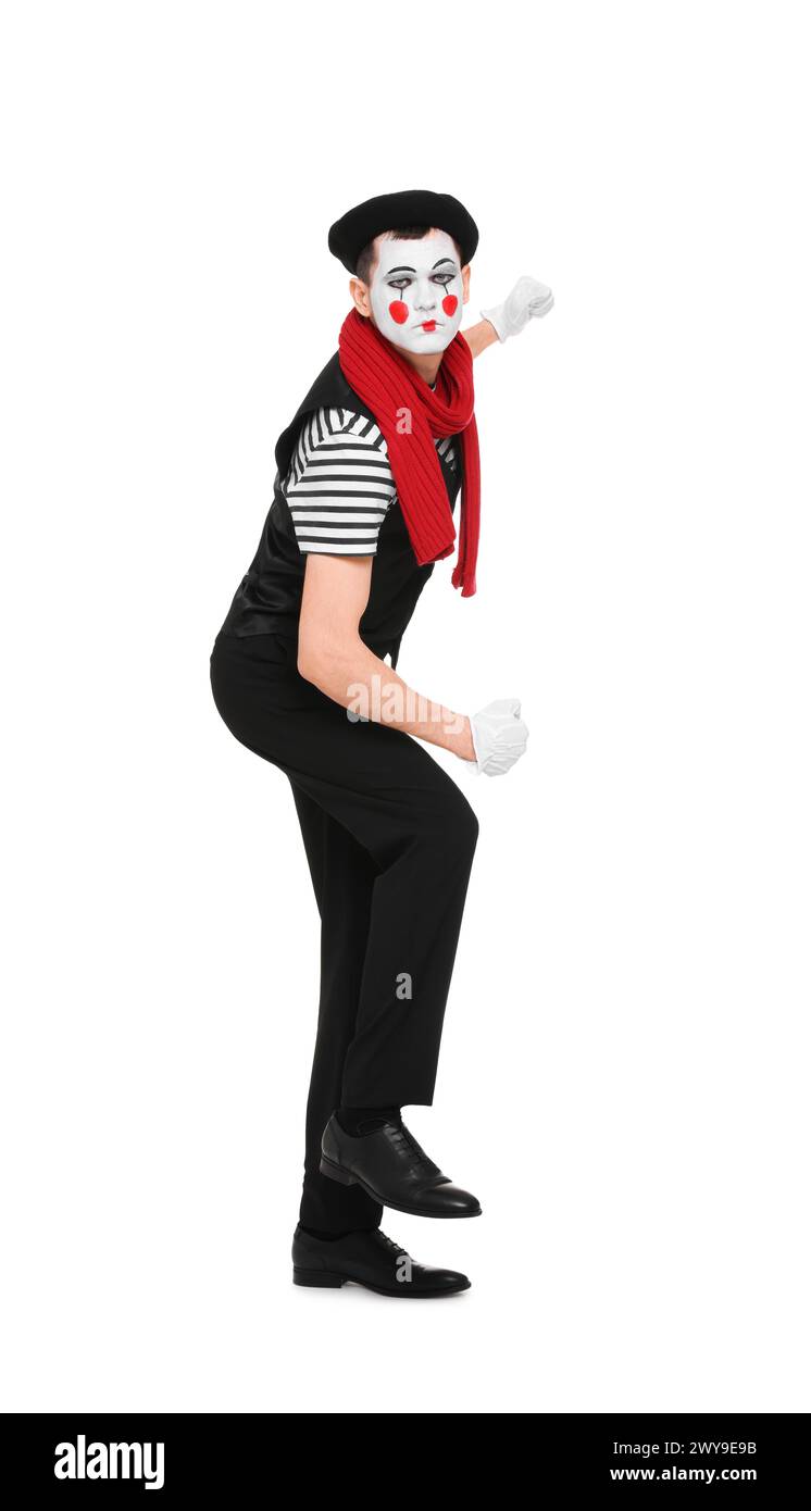 Funny mime artist in beret posing on white background Stock Photo - Alamy