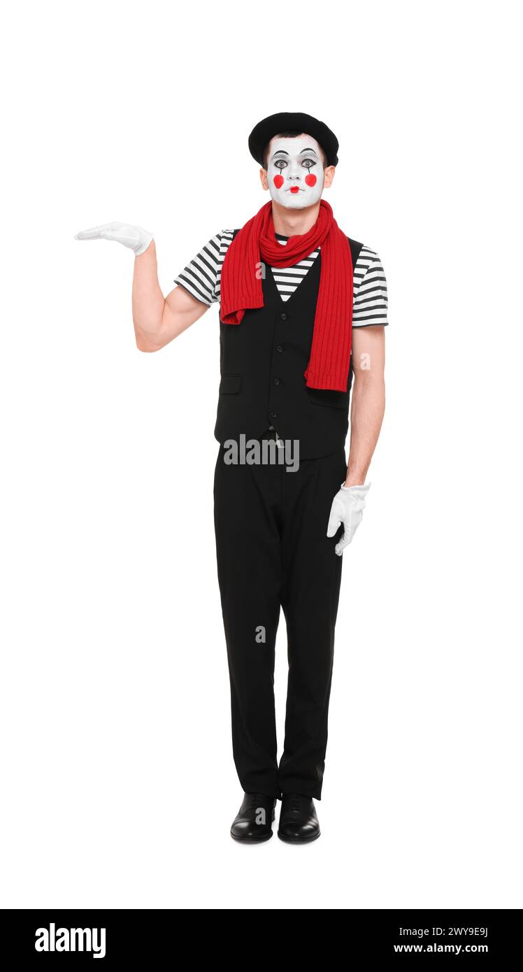 Funny mime artist in beret posing on white background Stock Photo - Alamy