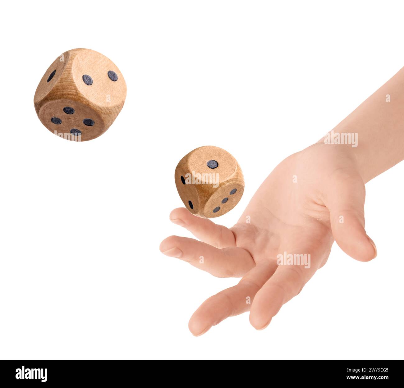 Woman throwing wooden dice on white background, closeup Stock Photo - Alamy
