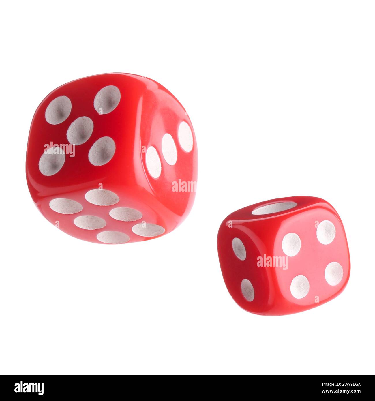Two red dice in air on white background Stock Photo - Alamy