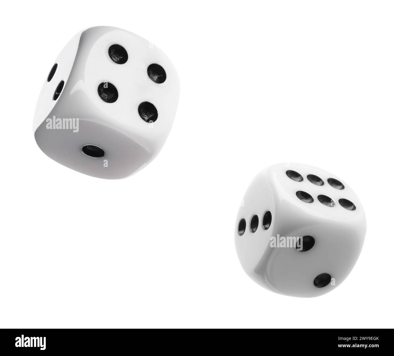 Two dice in air on white background Stock Photo - Alamy