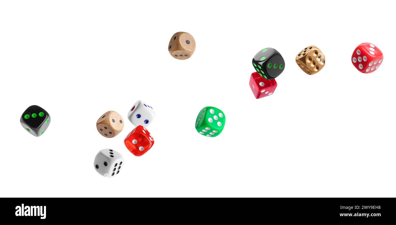 Many different dice in air on white background Stock Photo - Alamy