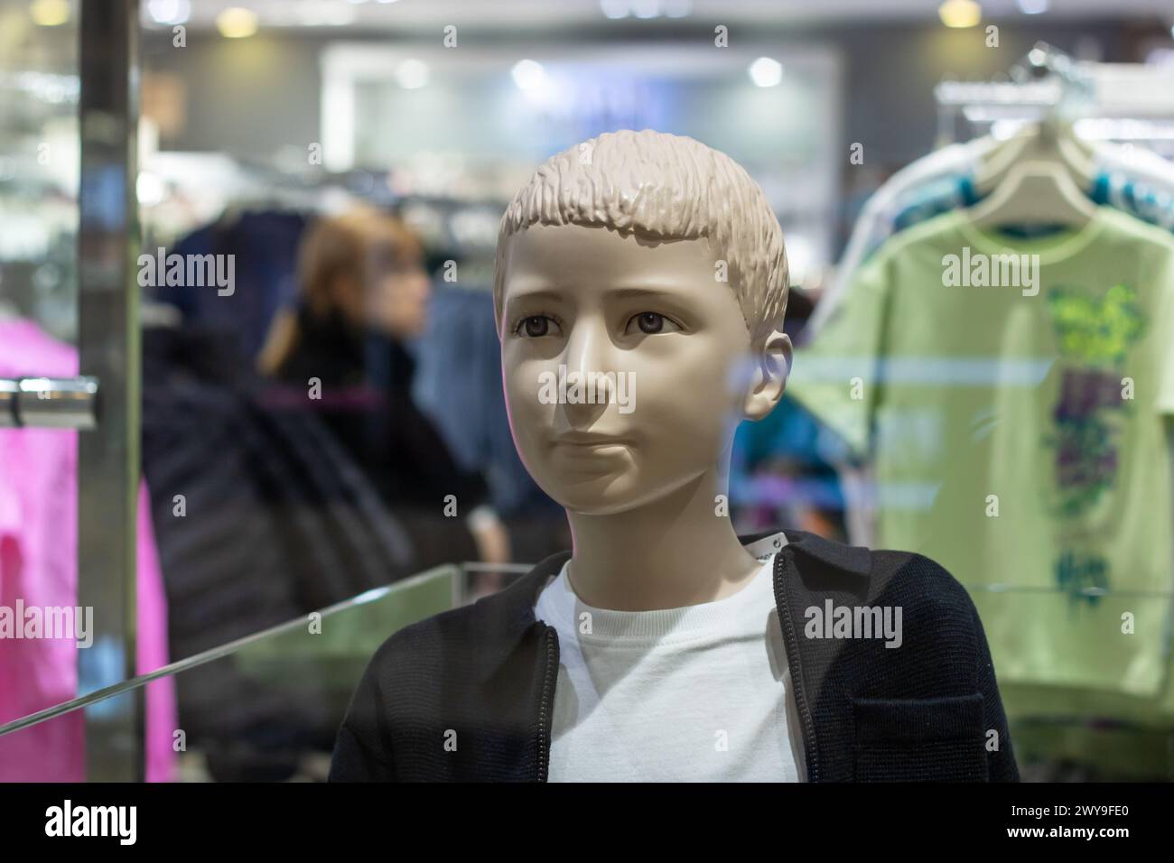 Baby mannequin in bright clothes in store close up Stock Photo - Alamy