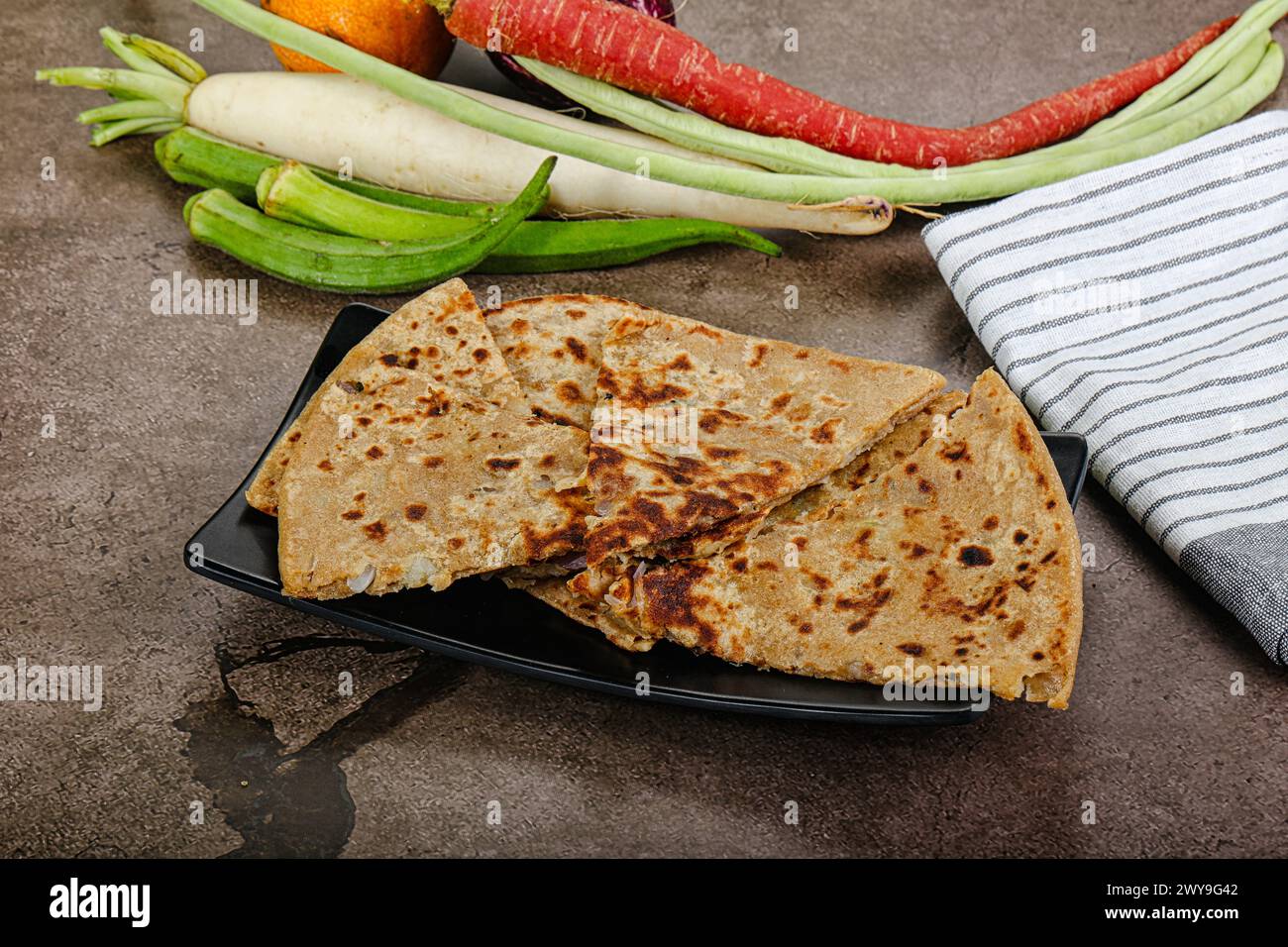 Indian vegetarian Aloo Paratha - bread with potato Stock Photo - Alamy