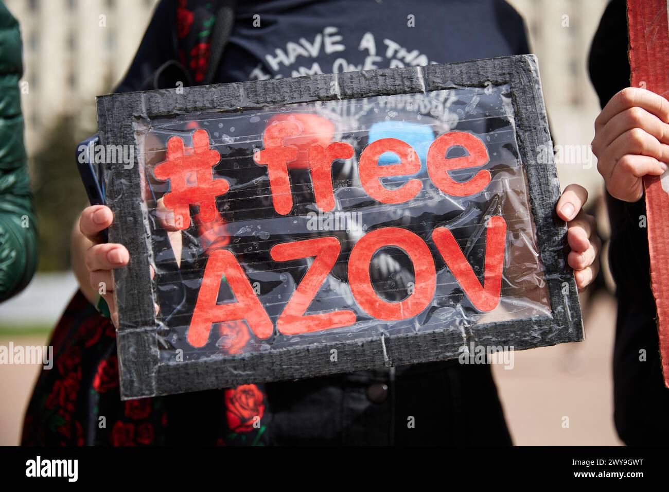 Handmade sign "Free Azov" in the hands of Ukrainian activists. Kyiv ...