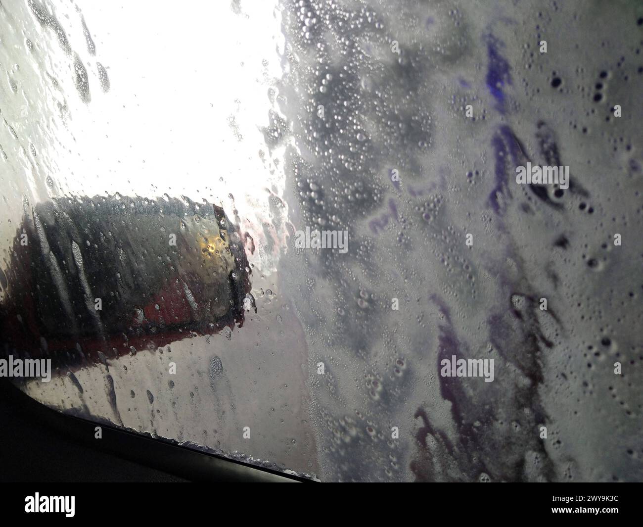 Auto waschen in einer Auto-Waschanlage Waschanlage *** Washing your car ...
