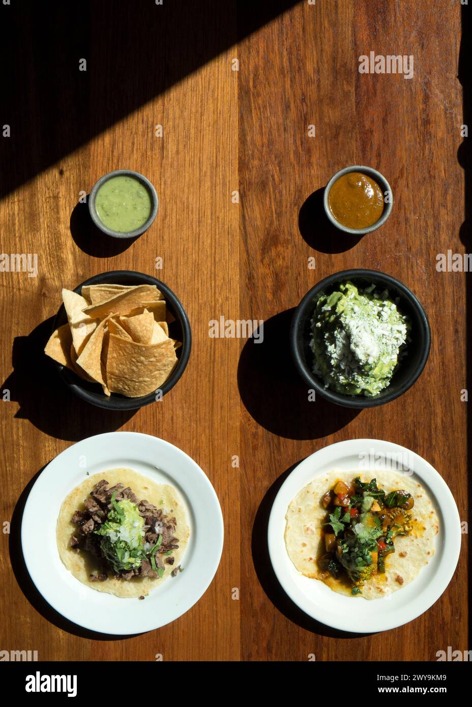 Mexican food overhead looking down tacos chips and salsa vertical Stock ...