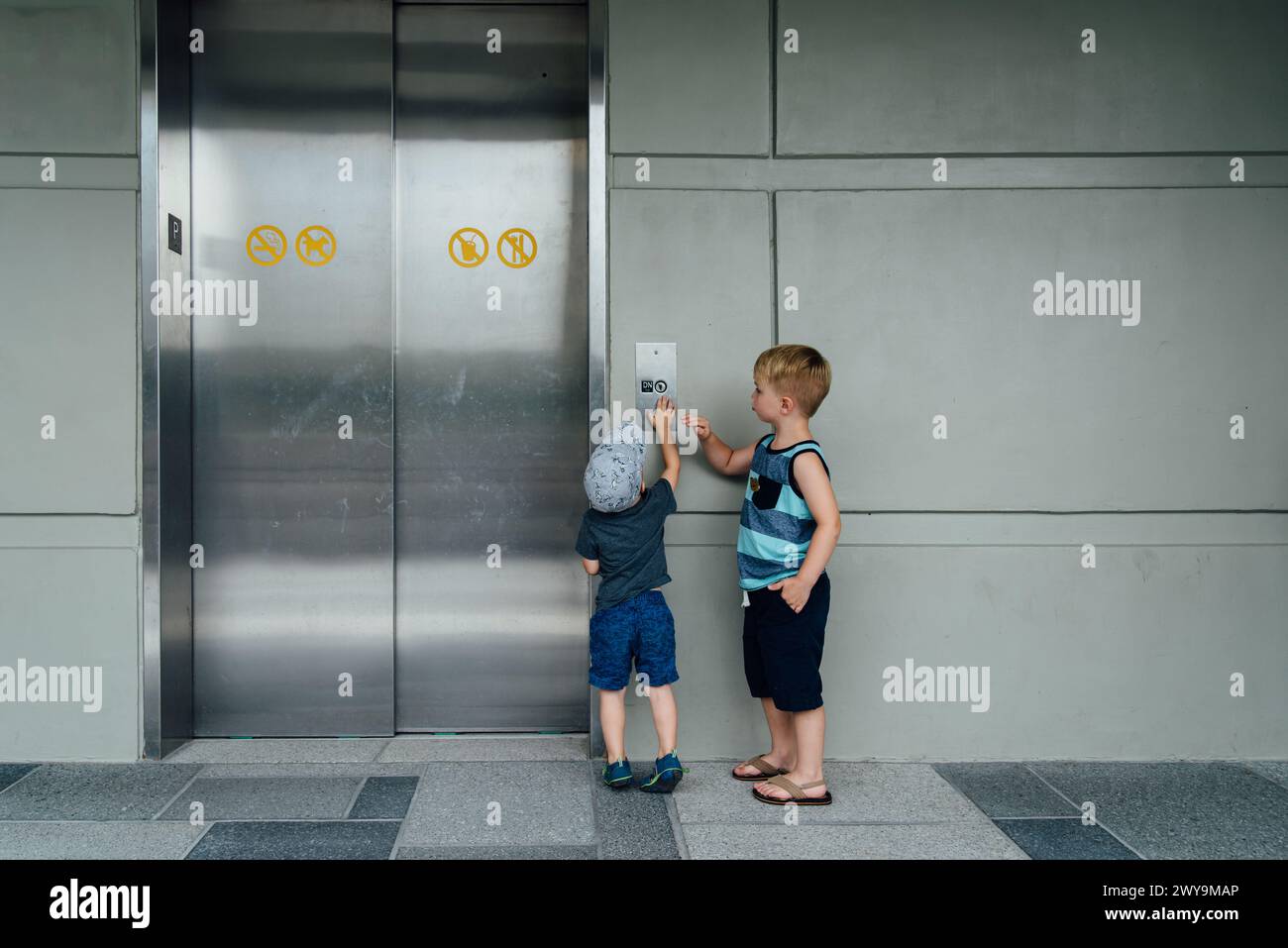 Elevator boys hi-res stock photography and images - Alamy