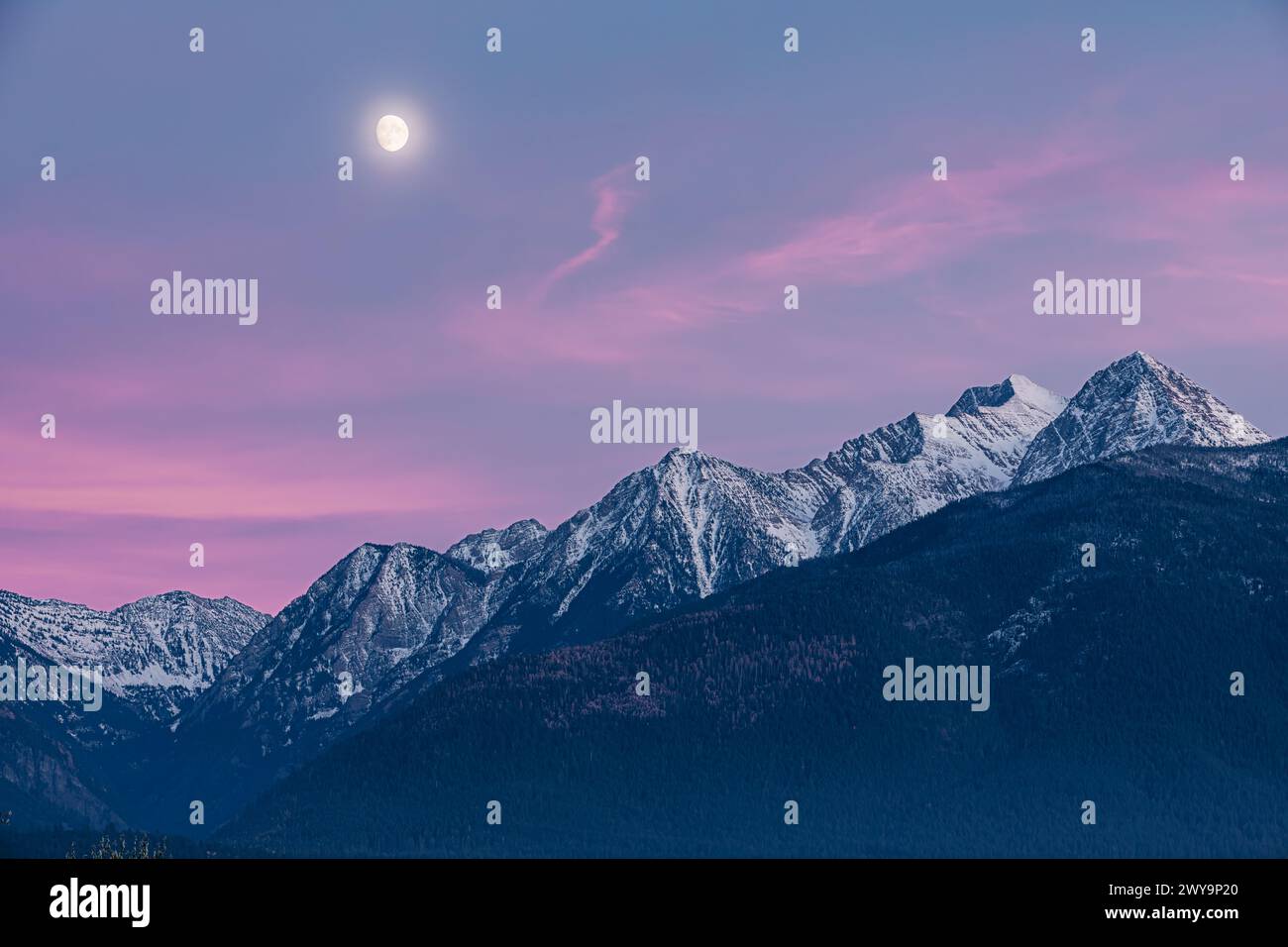 Full moon over snow capped hi-res stock photography and images - Alamy