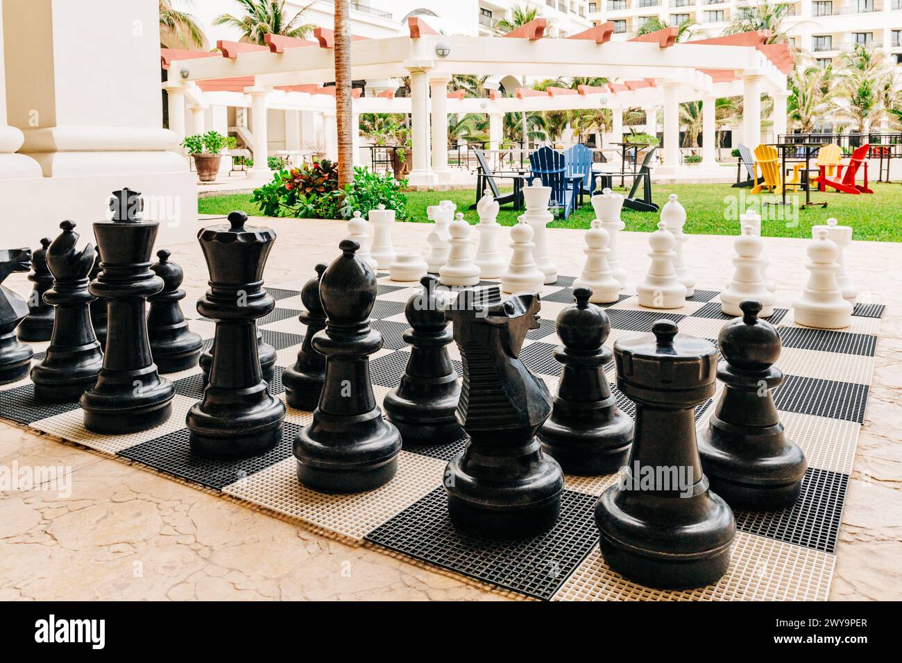Giant chess board and chess pieces at Cancun resort Stock Photo - Alamy
