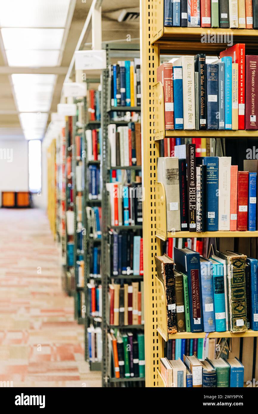 Interior of public library with shelves of books Stock Photo - Alamy