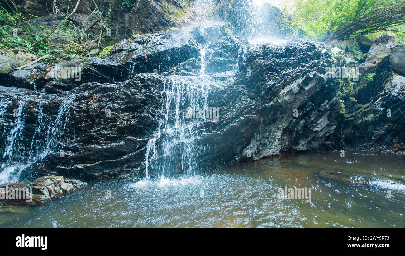 Serene waterfall cascades over natural hi-res stock photography and ...