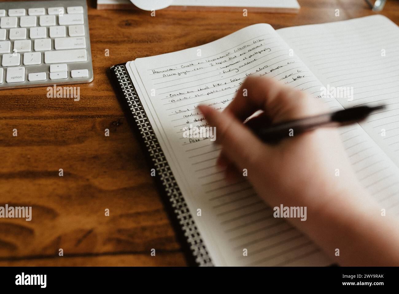 Concentrated student writing notes hi-res stock photography and images ...