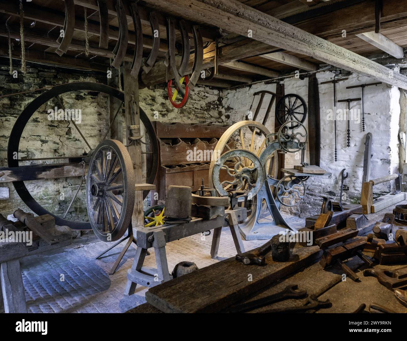 Traditional wheelwrights workshop at Cotehele Mill, Calstock, Cornwall ...