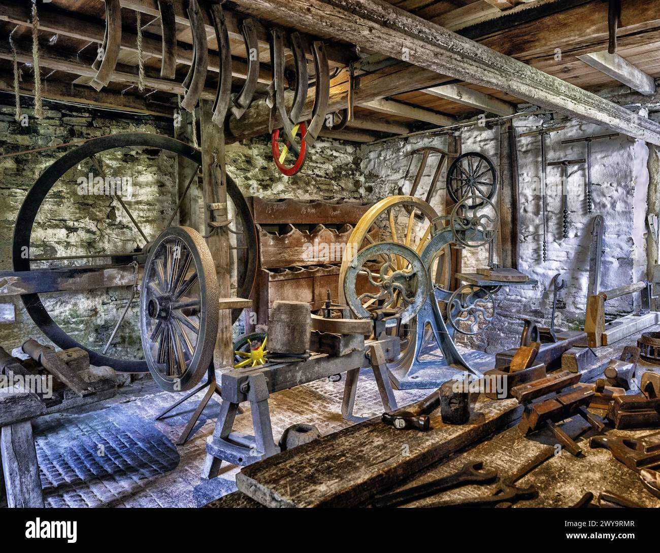 Traditional wheelwrights workshop at Cotehele Mill, Calstock, Cornwall ...