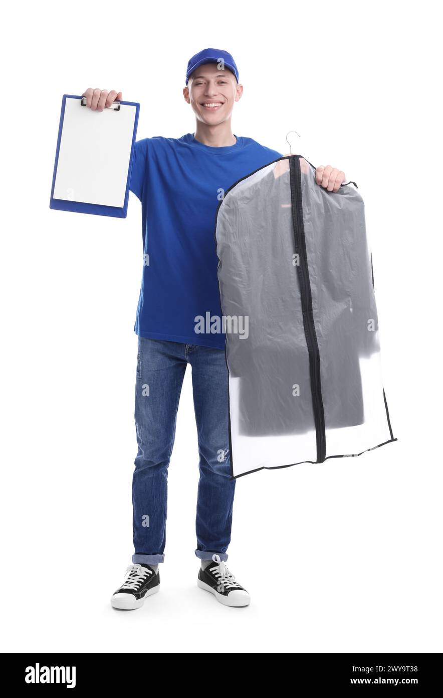 Dry-cleaning delivery. Happy courier holding garment cover with clothes ...