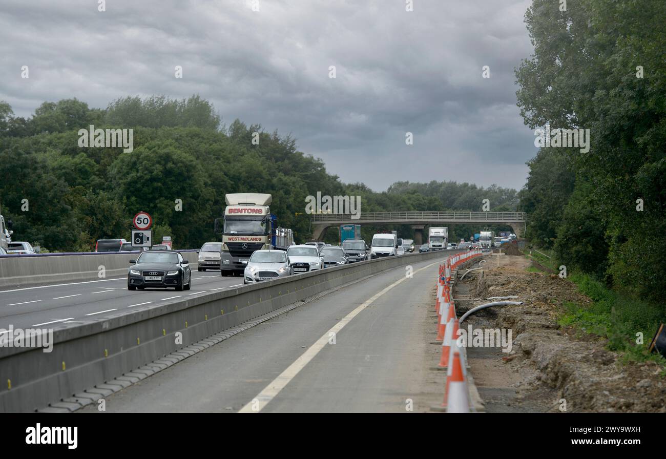Traffic passing roadworks on the M1 motorway, England Stock Photo - Alamy