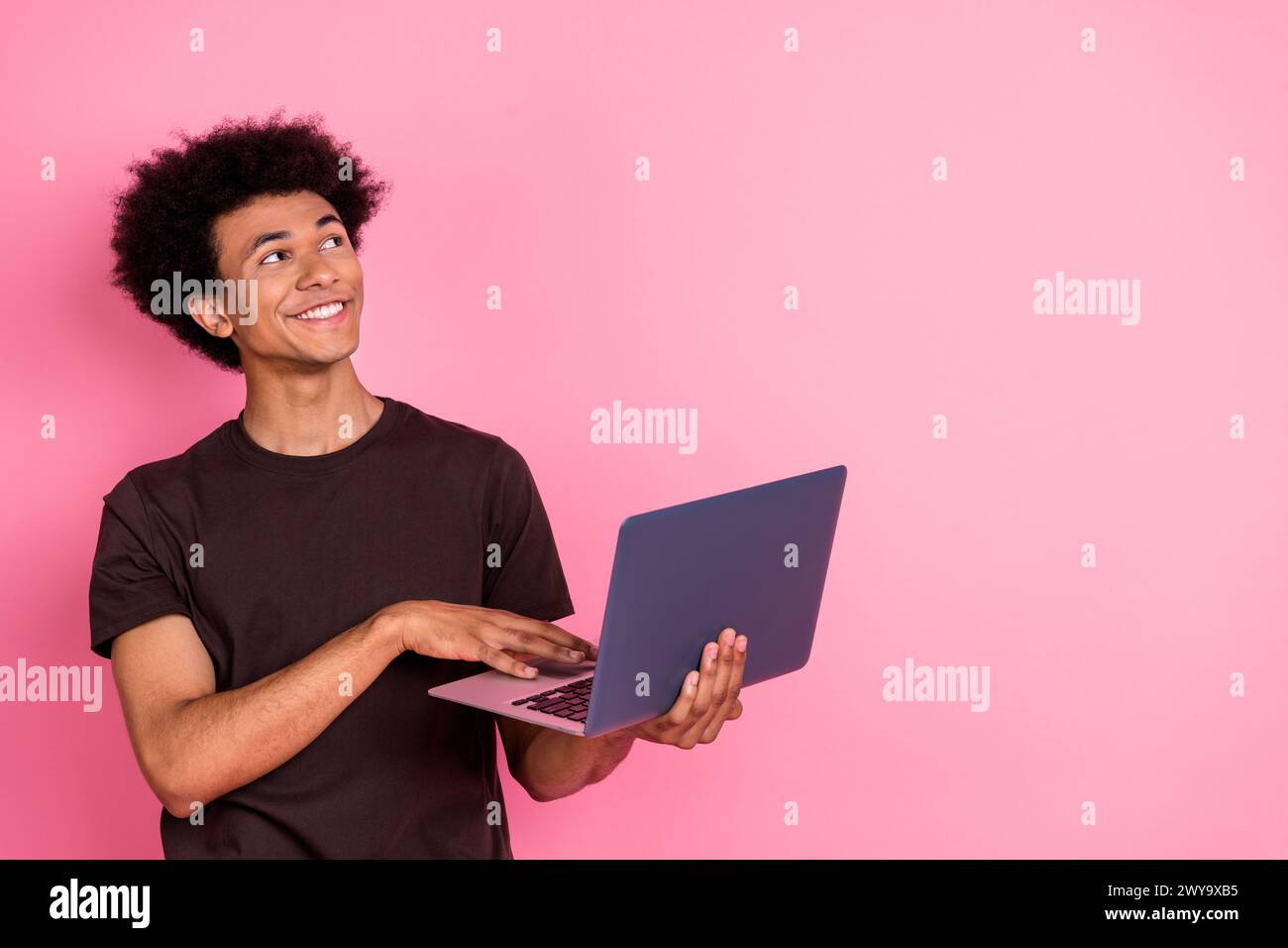 Photo of virtual assistant ai user young guy with laptop computer look ...