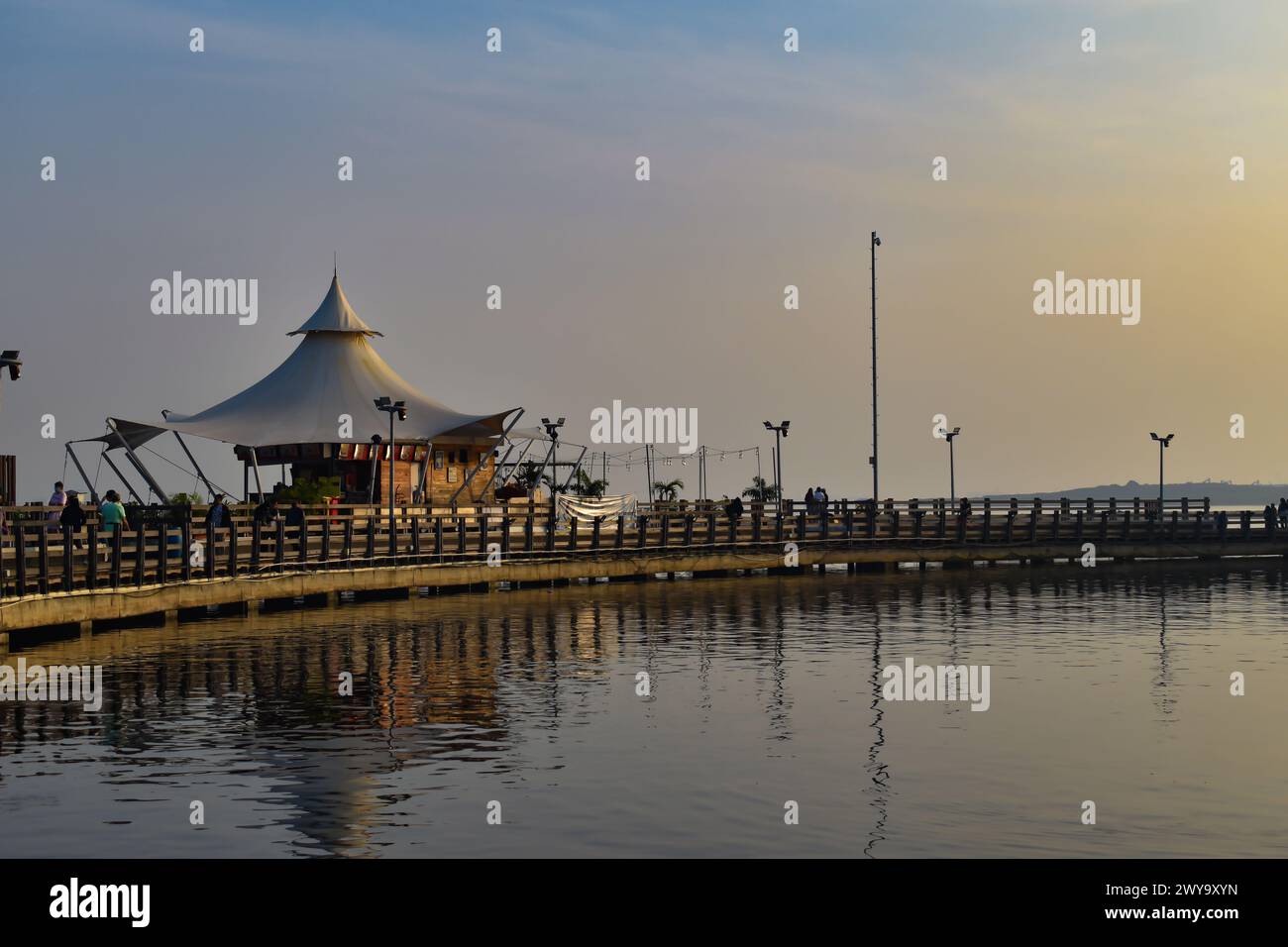 Beautiful sunrise at Ancol beach, Indonesia Stock Photo - Alamy