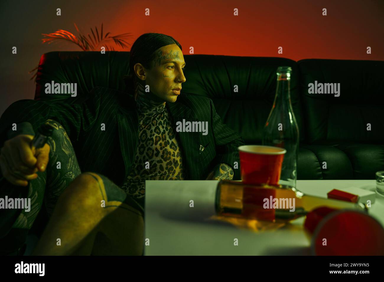 Young man seated table hi-res stock photography and images - Alamy