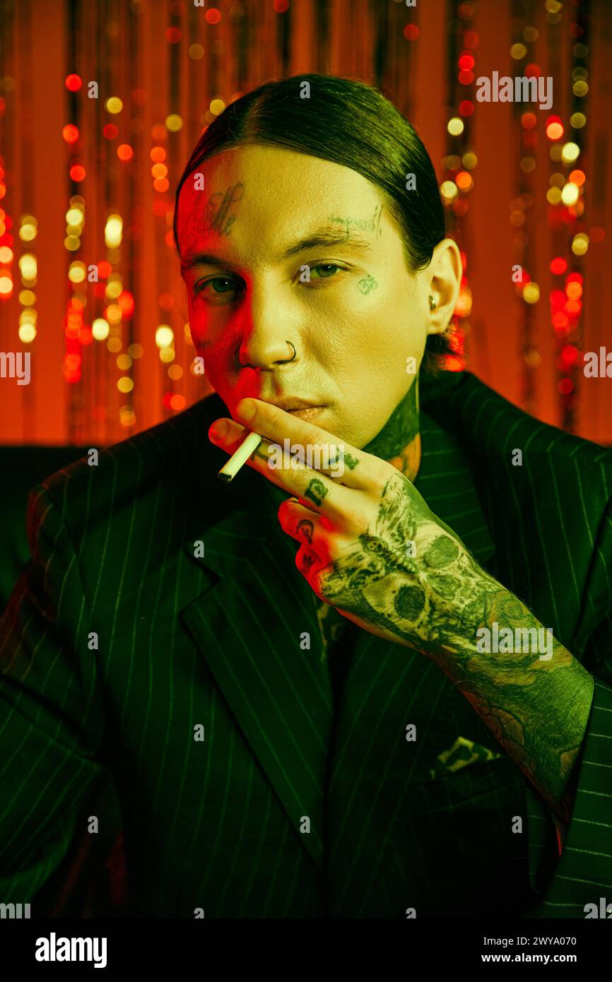 A man dressed in a suit smoking a cigarette outdoors Stock Photo - Alamy