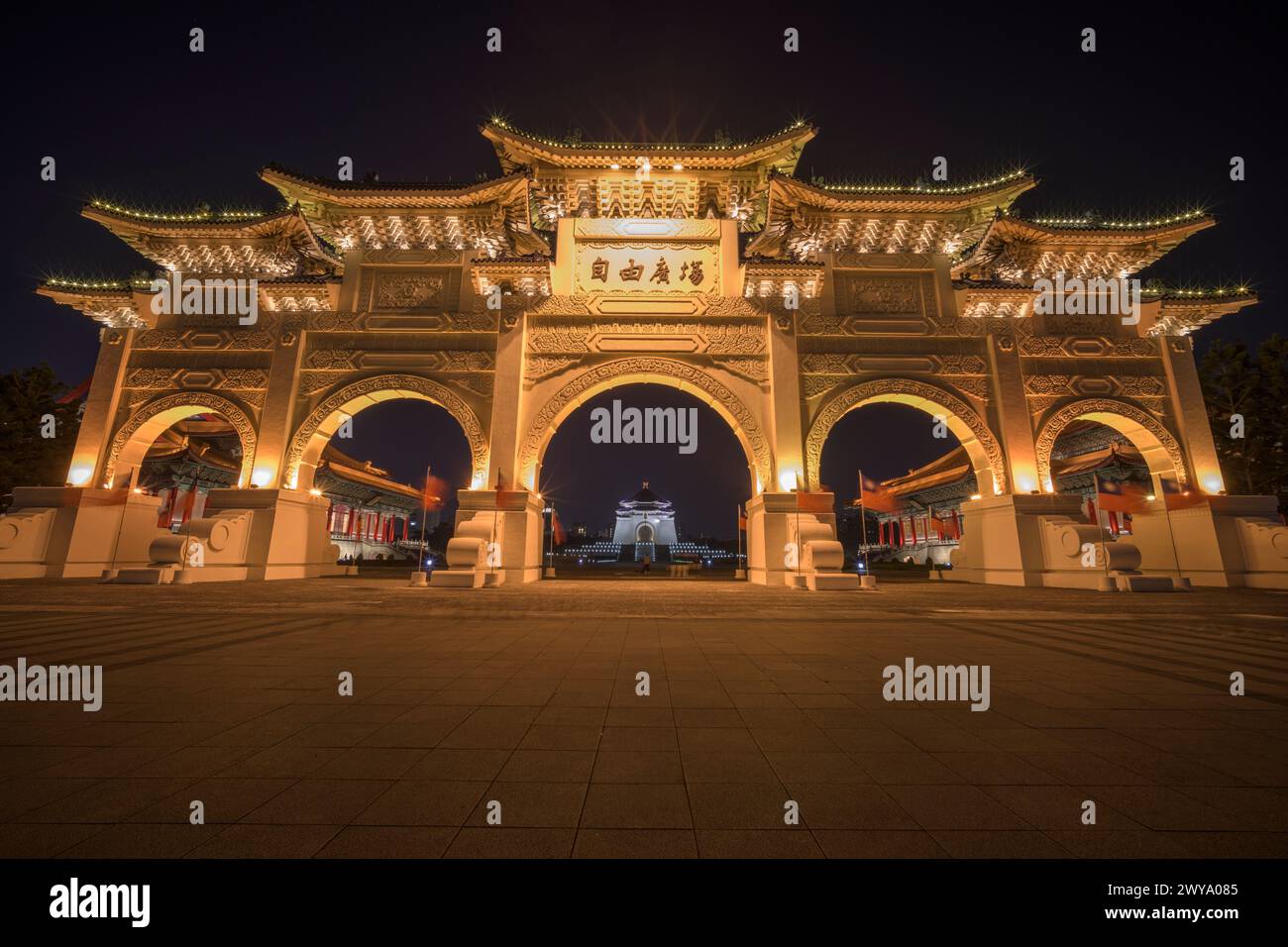 Liberty Square Arch gate illuminated at night Stock Photo - Alamy