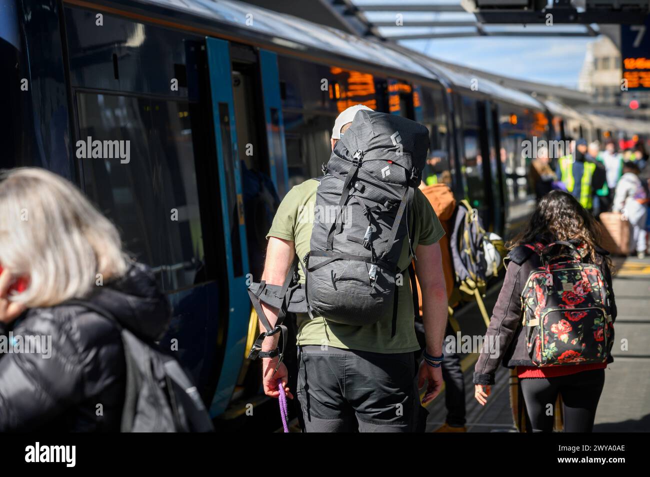 Passengers boarding a train at London Bridge railway station, London ...