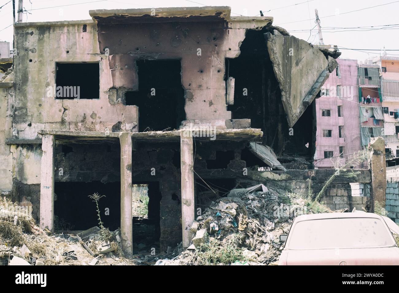 Memory lingers on the scars of conflict, evident in the bullet-riddled ...