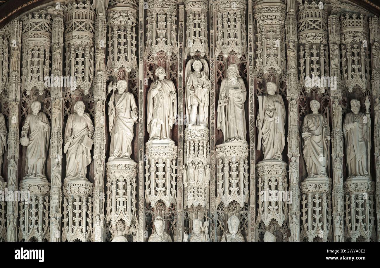 Stone statues, of important christian models, behind the altar in the ...