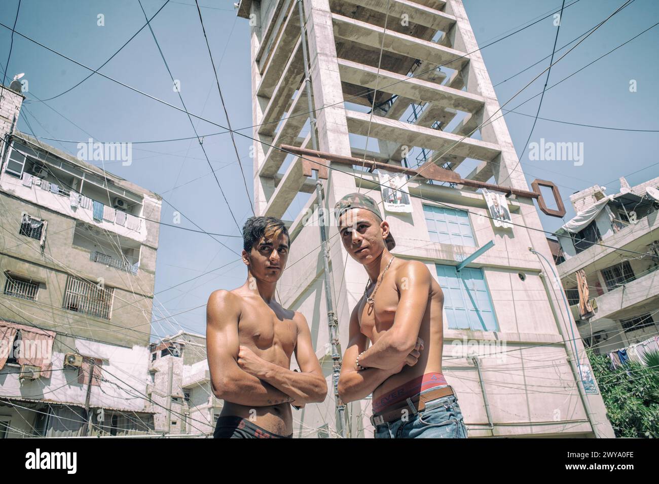 Palestinian teenager standing in front of the symbolic key for the ...