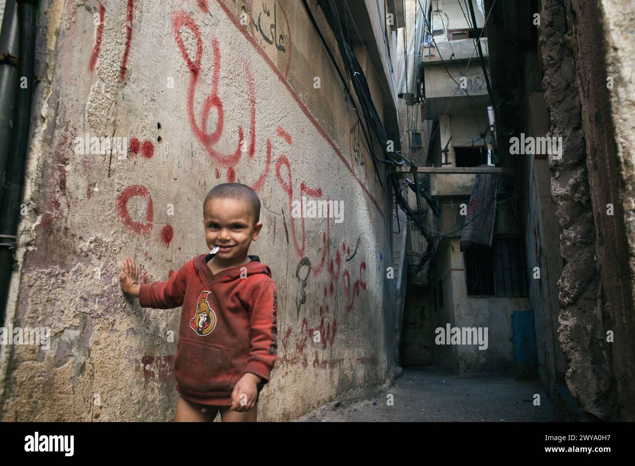 A lonely Palestinian kid in the streets of the Sabra-Shatila refugee ...