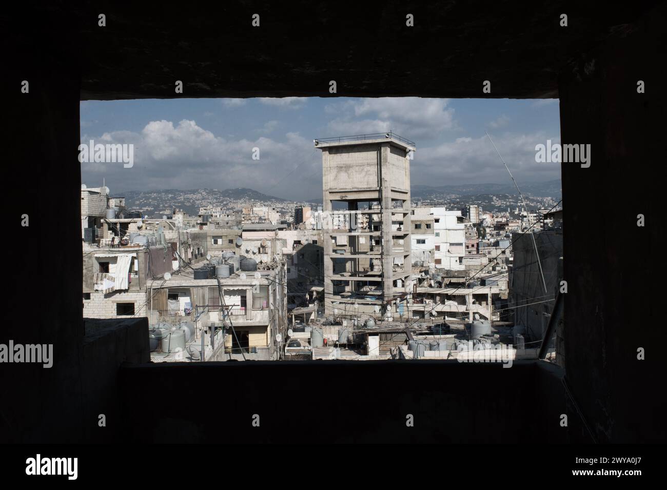 Photograph of the dynamic street life of Sabra-Shatila Refugee Camp in ...
