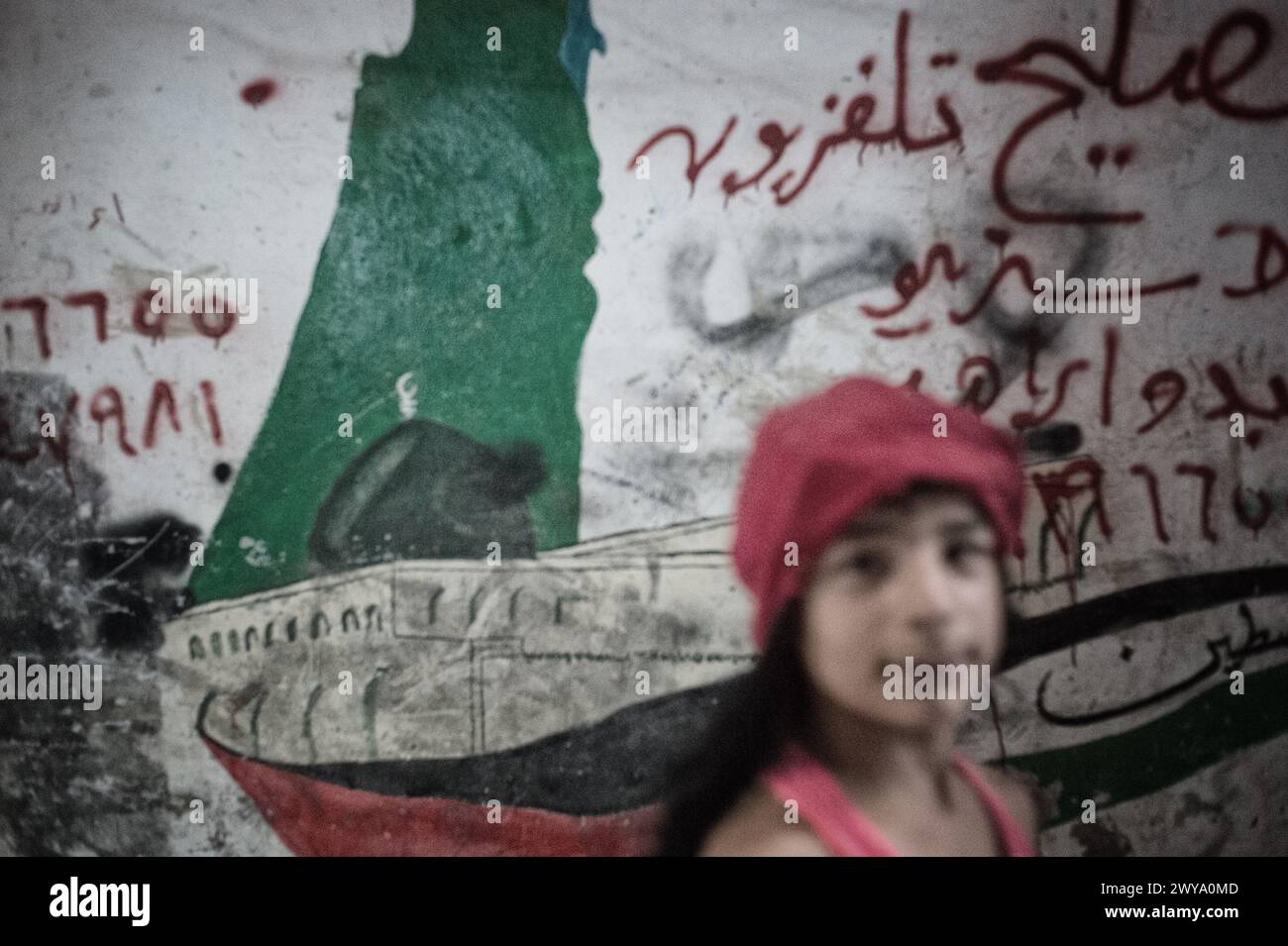A kid and the street art of the Sabra-Shatila Refugee Camp in Lebanon ...